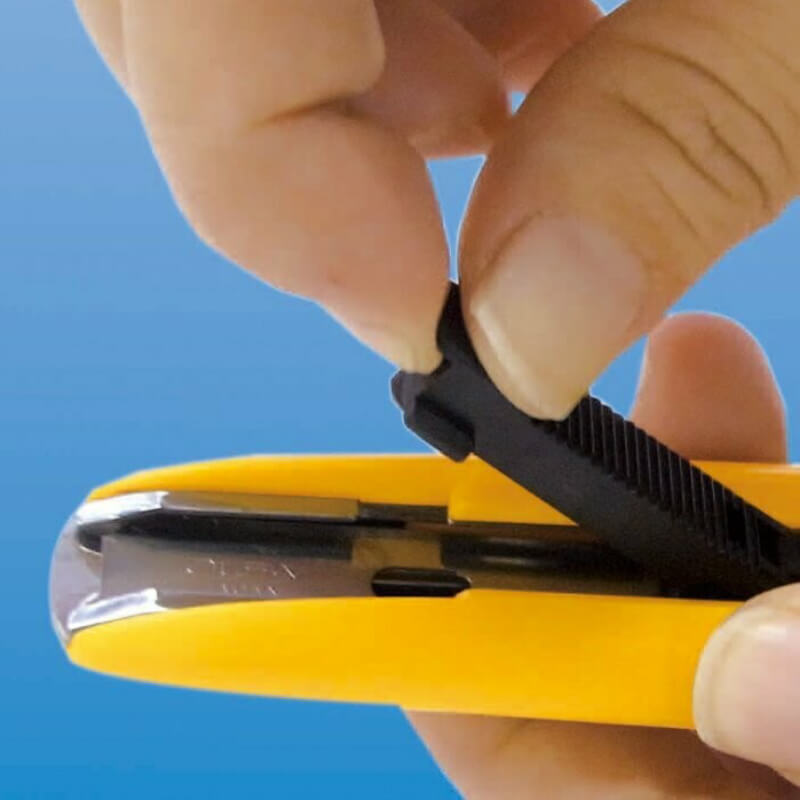 Suministros para las Artes Graficas: Cutter Olfa retractil SK-7